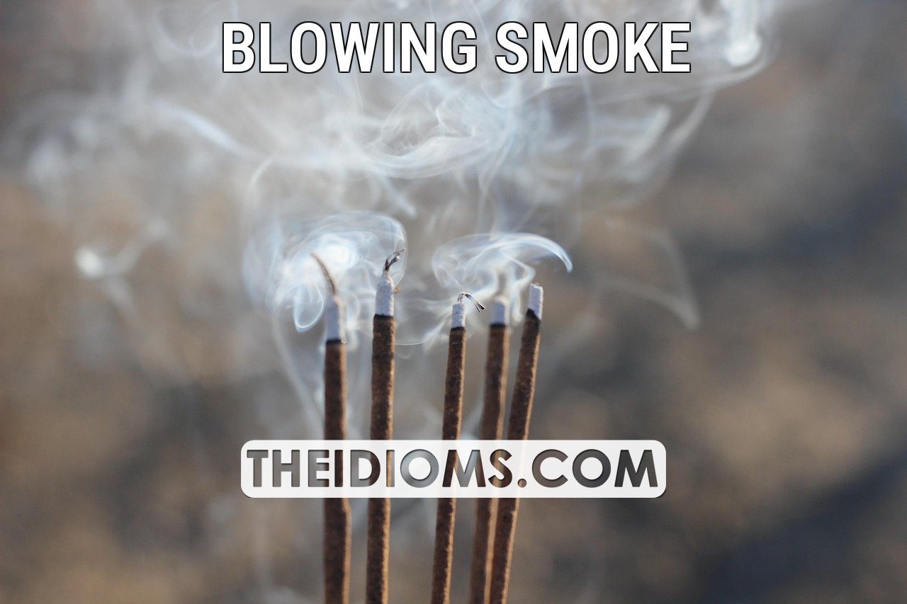 blowing smoke meaning, origin, example, sentence, history
